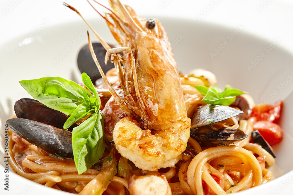 Italian dish - seafood linguine isolated on white background. Pasta ...