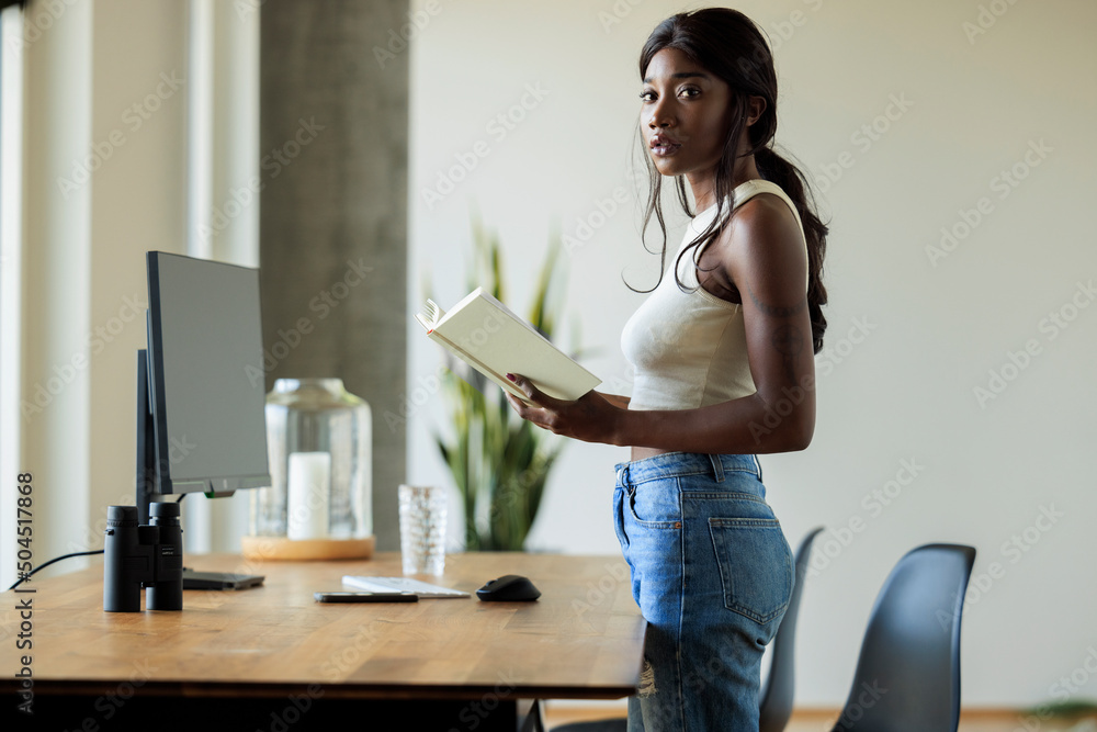 Portraiture of a young black woman Stock Photo | Adobe Stock