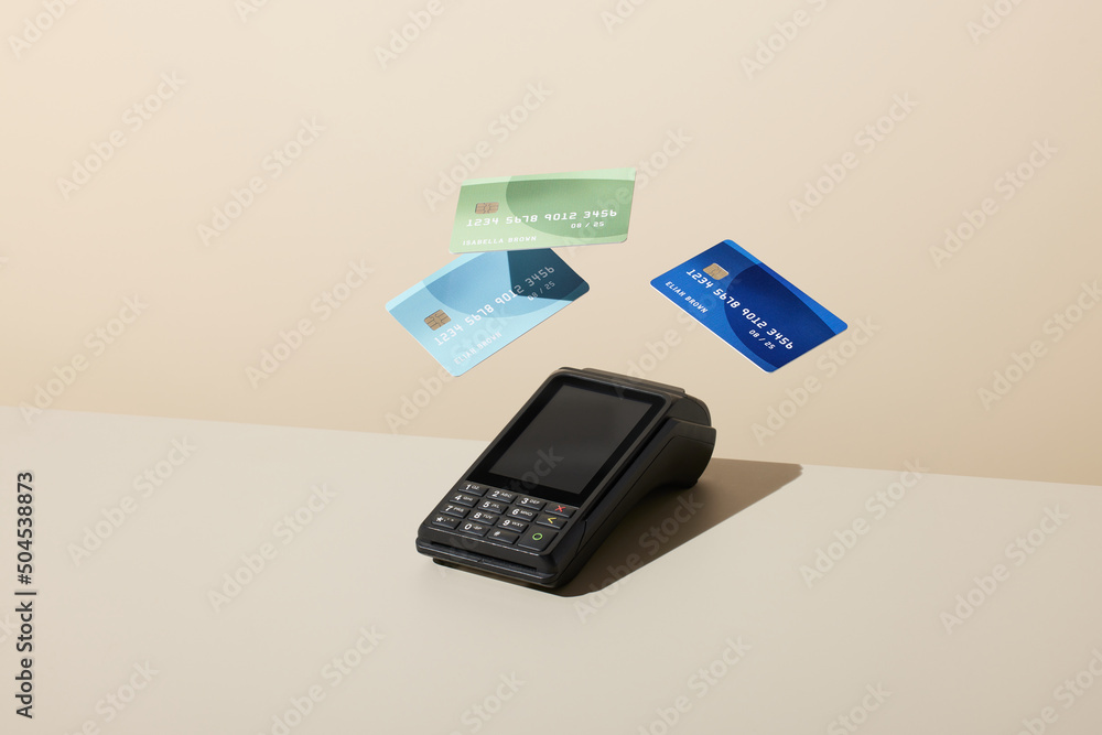 Credit cards over contactless terminal Stock Photo | Adobe Stock