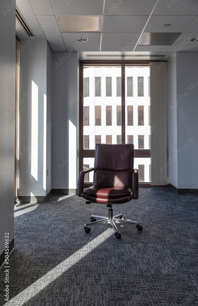 Office Chair in Empty Office in Downtown office building Stock Photo ...