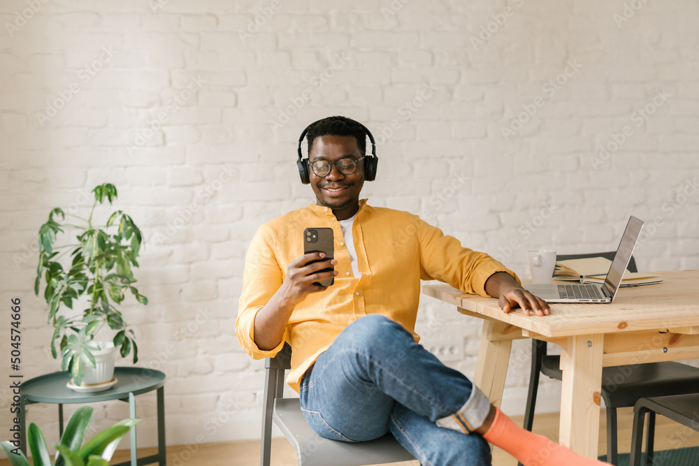 Man Looking At Memes On His Mobile Phone Stock Photo | Adobe Stock