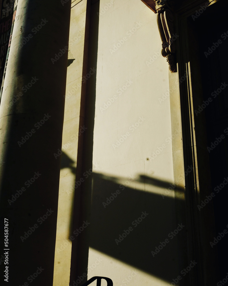 Shadow cast by pillar - 16th century building Stock Photo | Adobe Stock