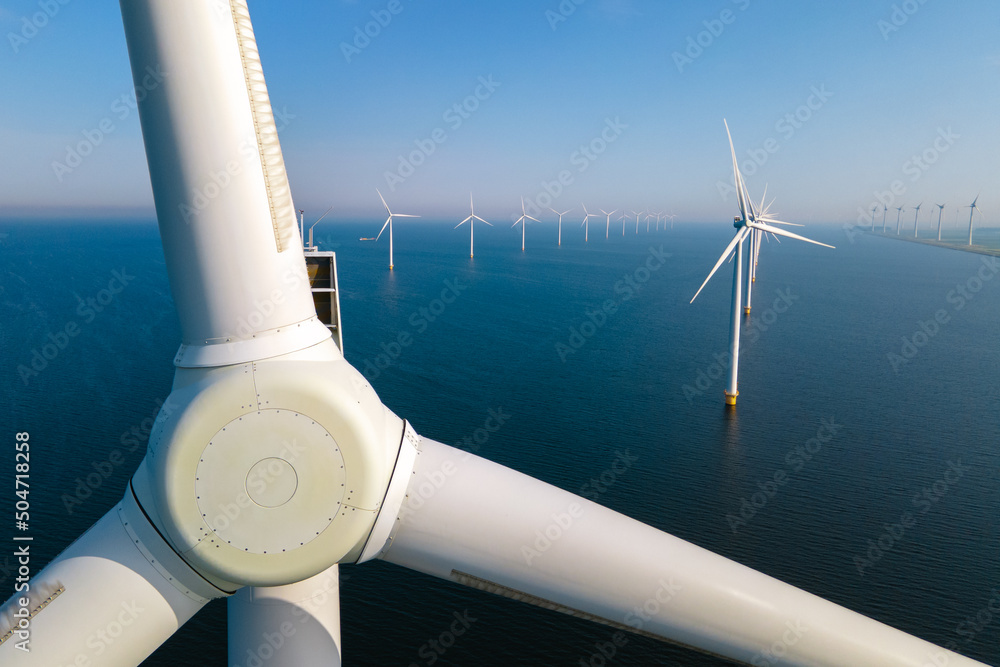 Offshore Windmill farm in the ocean Westermeerwind park, windmills ...