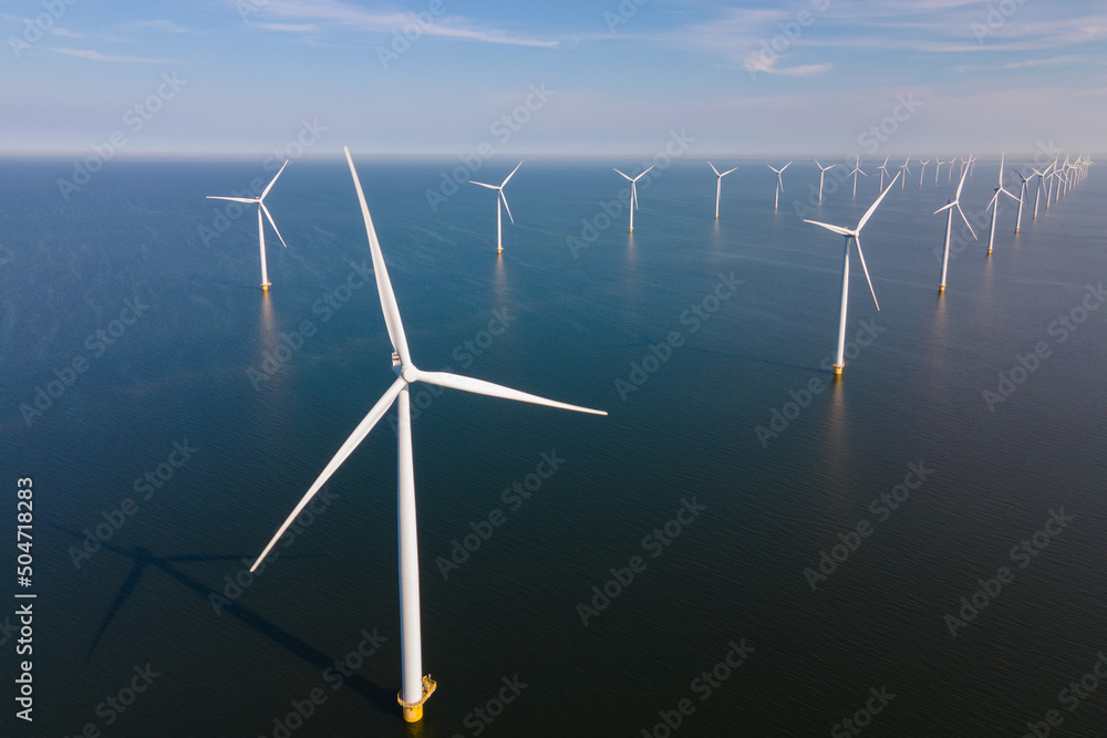 Offshore Windmill farm in the ocean Westermeerwind park, windmills ...
