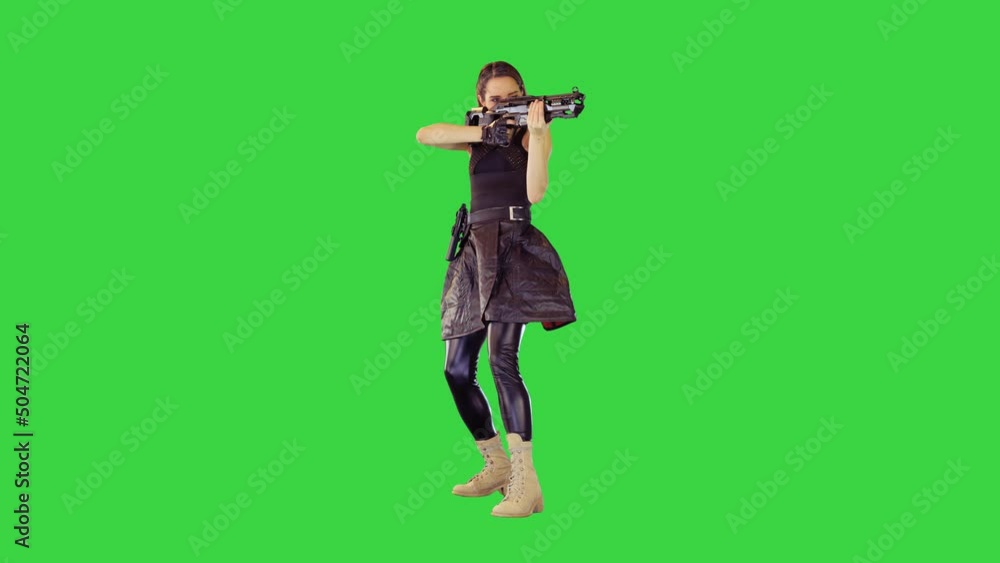 Girl with a gun searches for aim and makes a single shot on a Green ...