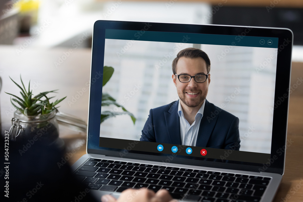 Laptop display with interface of video call to happy successful ...