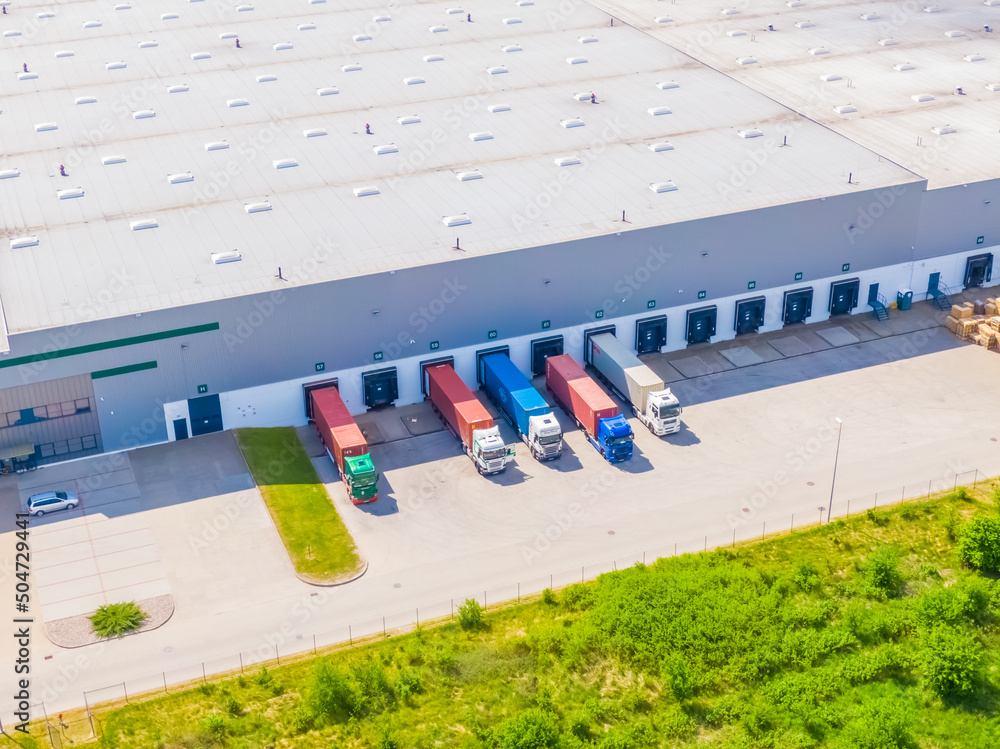 Aerial view of a logistics park with warehouse, loading hub and many ...