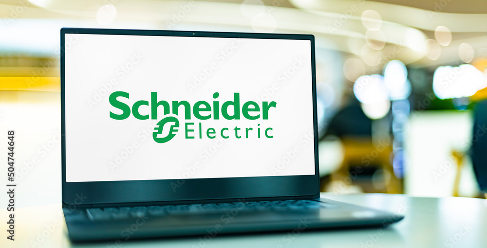 Laptop computer displaying logo of Schneider Electric Stock Photo ...