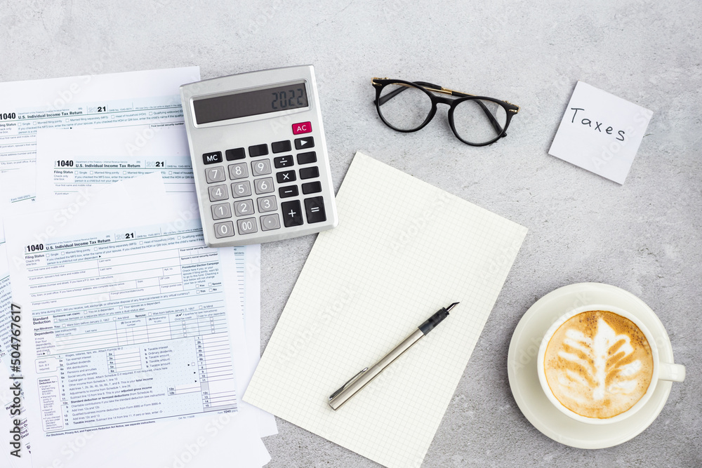 Flat lay of Individual income tax return form for tax payment on ...