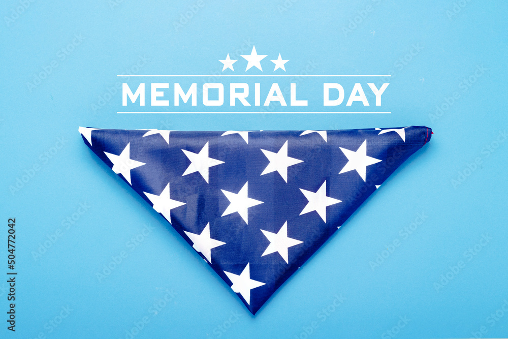 Folded USA flag on a blue background. Concept Memorial Day ...