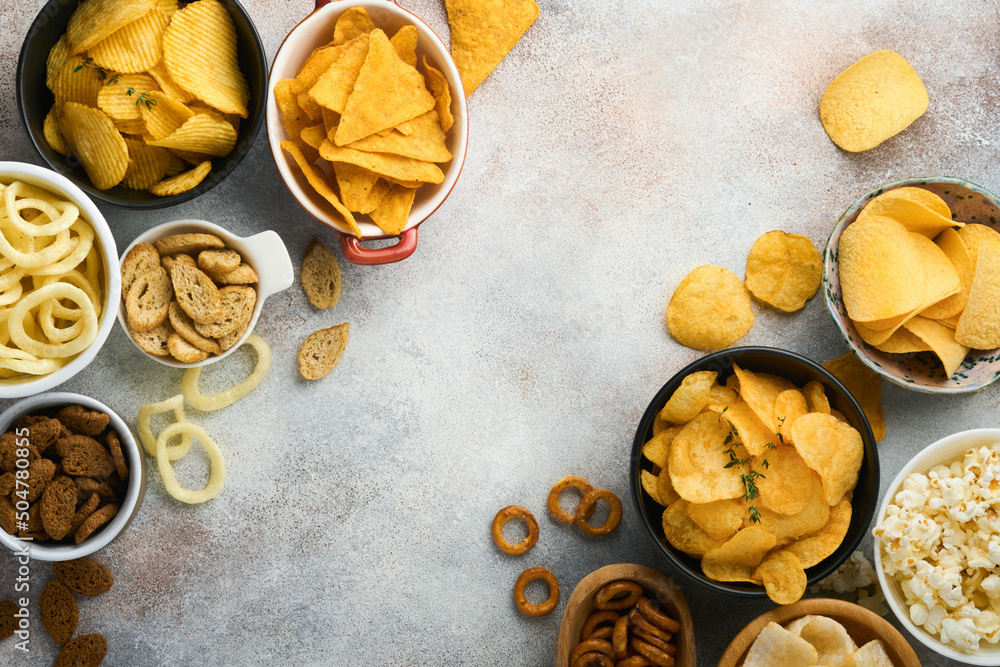 Snacks. Unhealthy food. All classic potato snacks with peanuts, popcorn ...