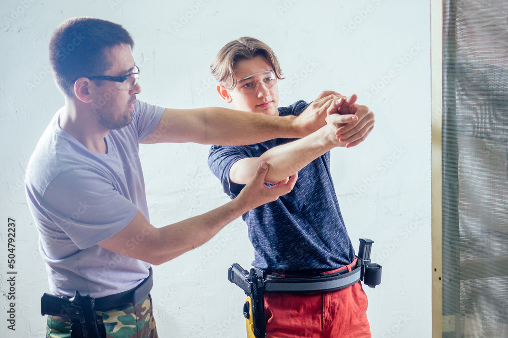 people learning to use the guns. self defense local defense concept ...