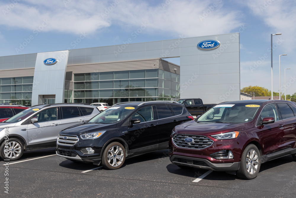 Used car display at a Ford dealership. With supply issues, Ford is ...