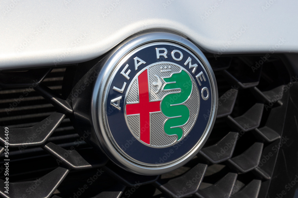 Alfa Romeo Giulia display at a Stellantis dealership. The logo shows a ...