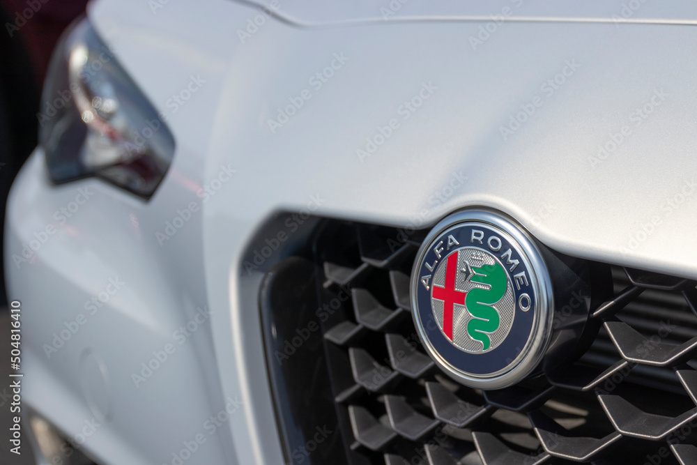 Alfa Romeo Giulia display at a Stellantis dealership. The logo shows a ...