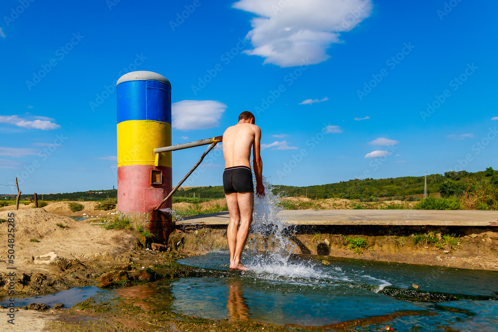 Tourist on natural thermal springs of mineral water. Background with ...