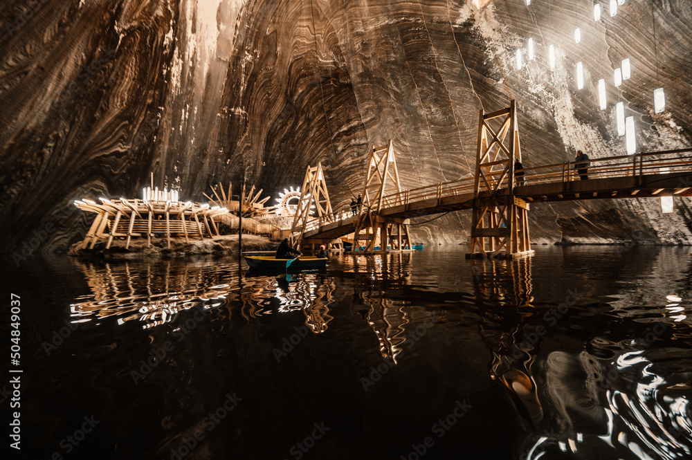 Underground theme park in big salt mine Salina Turda, Turda in Romania ...