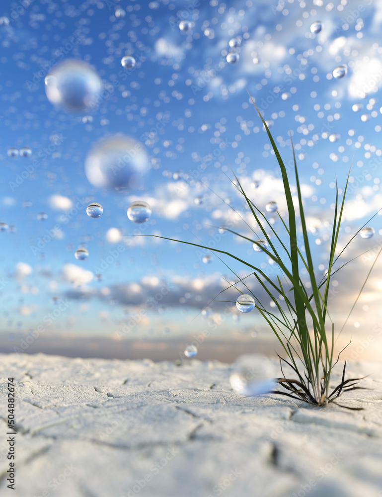 First rainfall water droplets falling onto a cracked dry earth after a ...