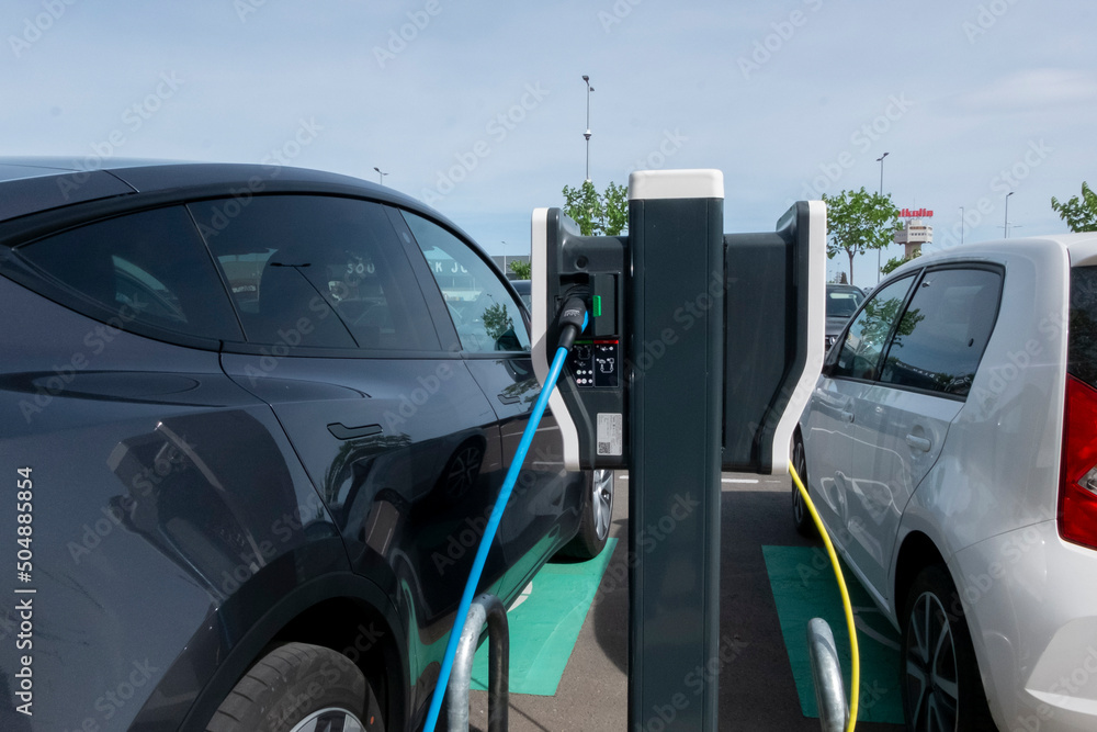 ZARAGOZA, SPAIN, 30 April 2022; electric vehicles charging the battery ...