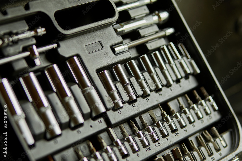 Open set box with working tools different types of metal steel heads ...