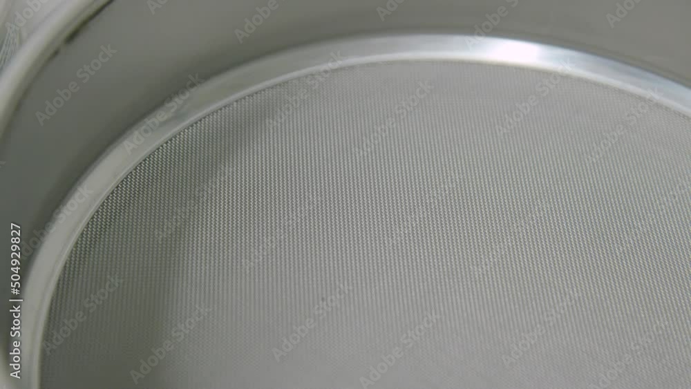 Aluminum lab sieve for particle separation. Empty sieve shaker mesh. Particle analysis and ...