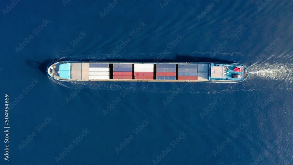 Aerial top view of cargo container ship. Huge cargo ship crossing the ...