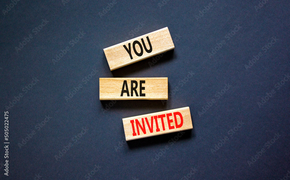 You are invited symbol. Concept words You are invited on wooden blocks ...