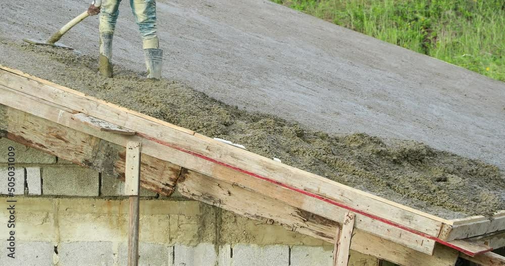 Process of building roof manually of houses , mixing cement to ...
