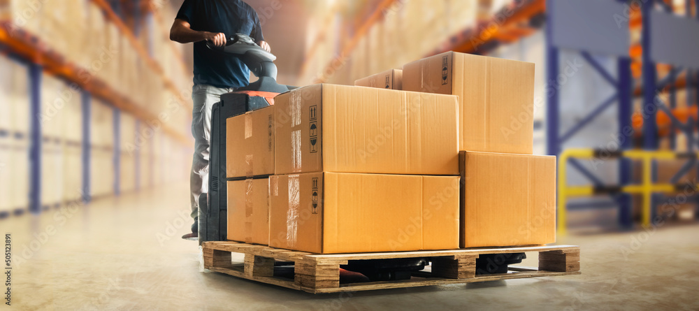 Workers Unloading Package Boxes on Pallet in Storage Warehouse ...