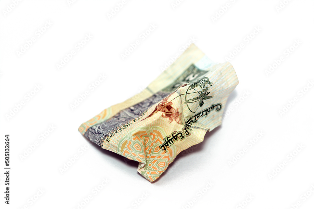 Crumpled Egyptian money of 20 LE twenty pounds isolated on white ...