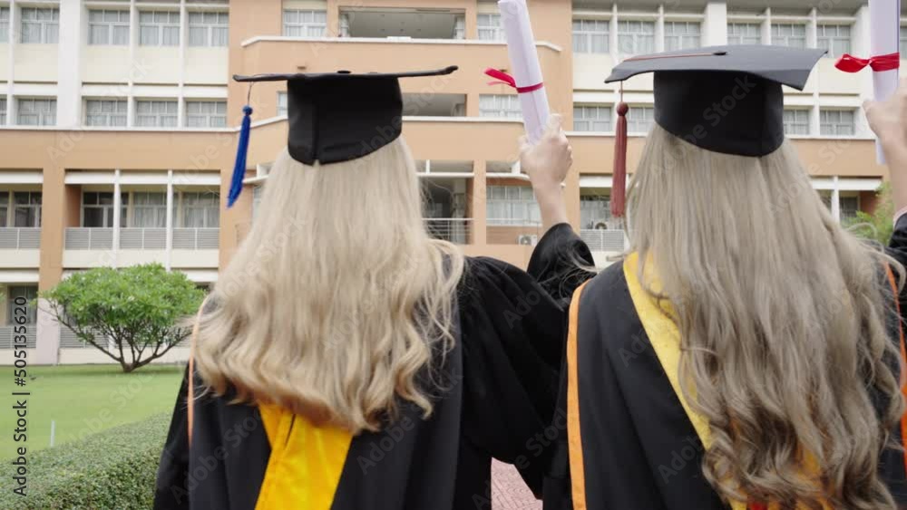 Two Asian female students congratulate graduation ceremony at the ...