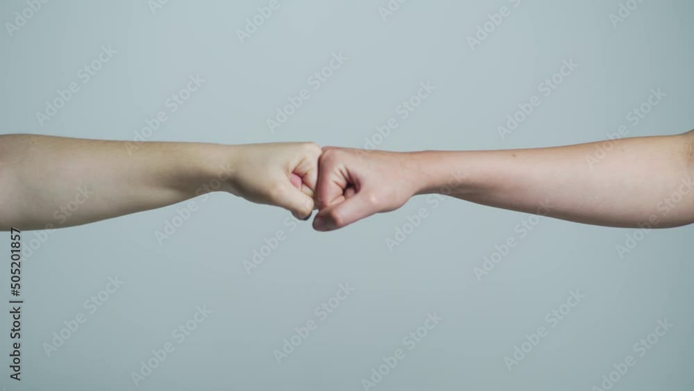 Vidéo Stock People Bumping Their Fists Together Arms Friendly