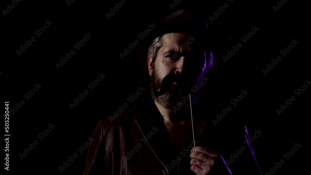 Portrait of funny bearded man detective. Hipster in funny big ...