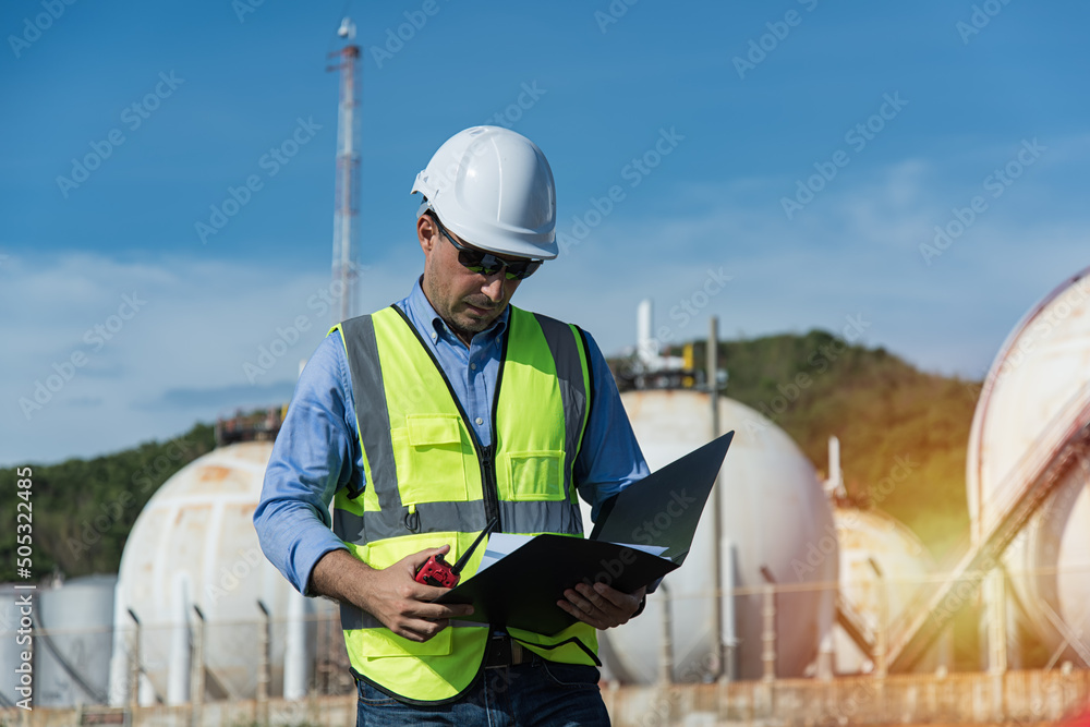 engineer at work in site. Person in helmet with folder. person in ...