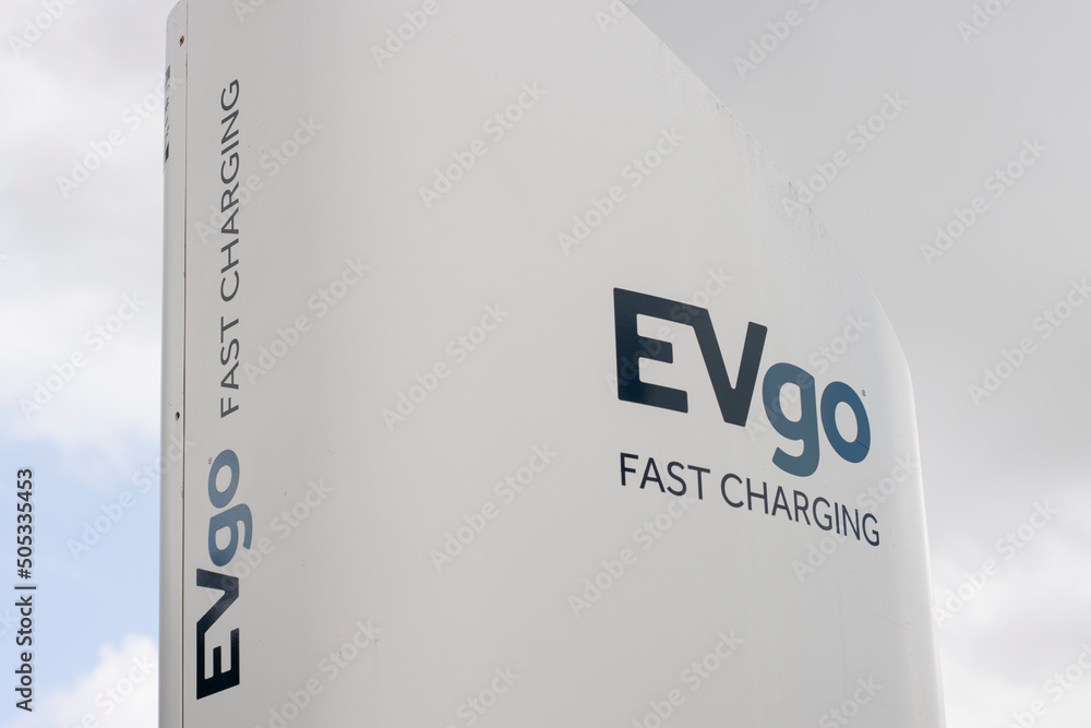 Santa Ana, CA, USA - May 9, 2022: Closeup of the EVgo logo seen on an ...