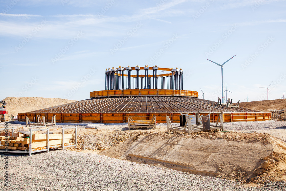 Construction site. concrete foundation of wind turbines with concrete ...