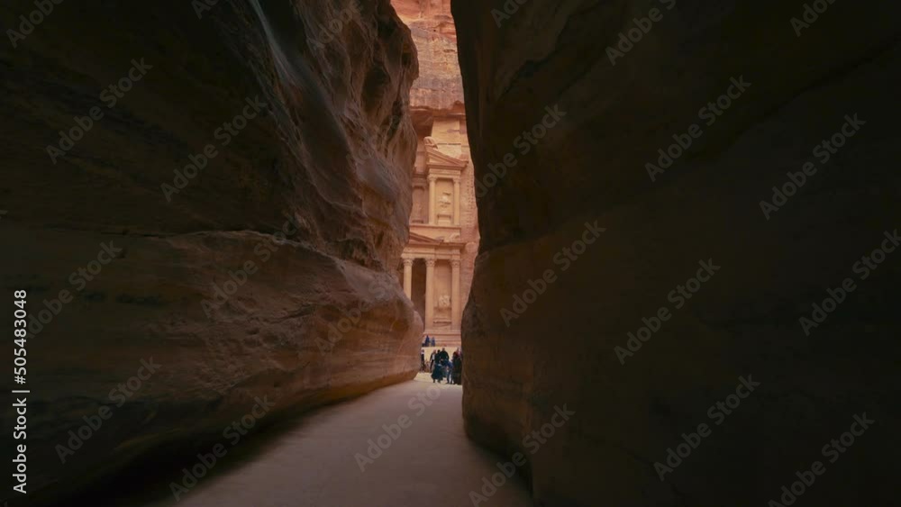 Walking toward The Treasury at Petra through the Siq, historic UNESCO ...