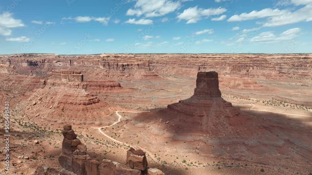 Aerial Valley of the Gods Utah landscape rock towers shadows fast ...