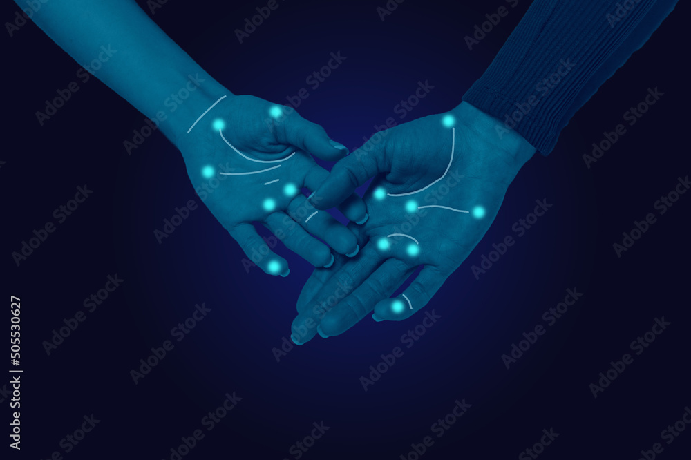 Hands close-up on a blue background with dots of identification ...