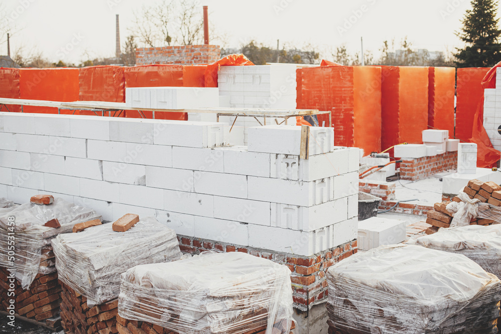 Autoclaved aerated blocks on concrete foundation, process of house ...