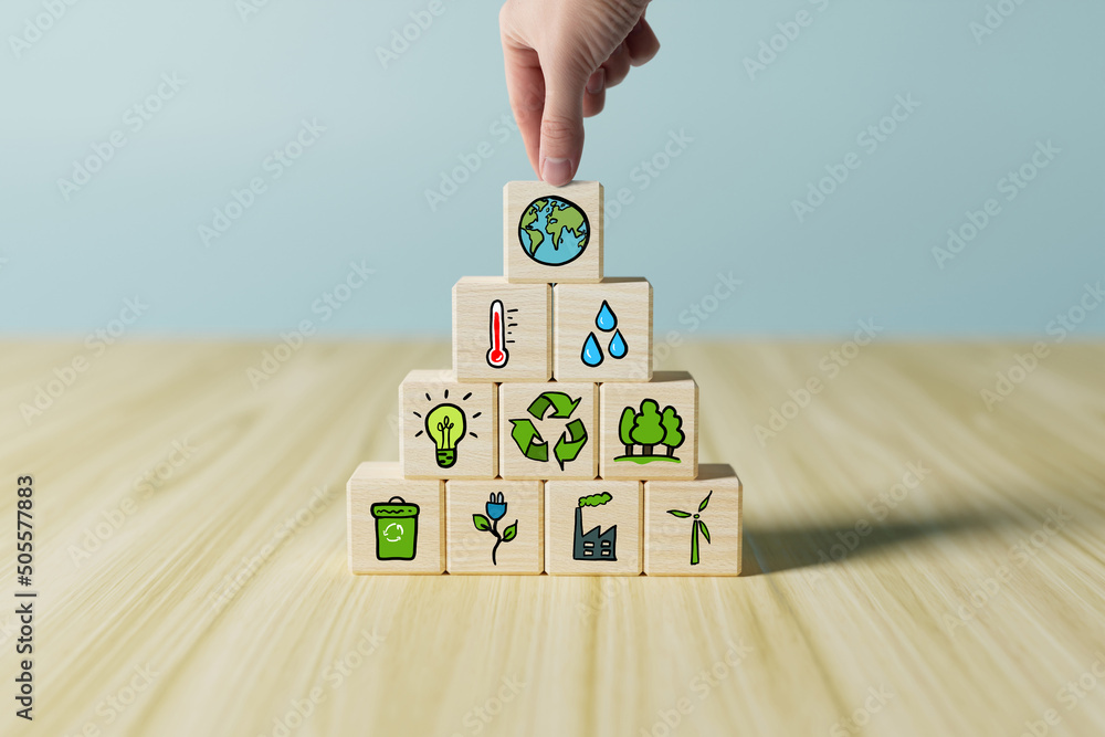 Wooden cubes with pictures of Earth, ecology, rain, temperature ...