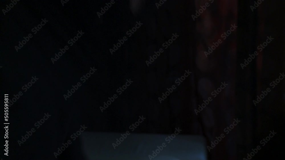 True crime scene- masked serial killer frantically stabbing something ...