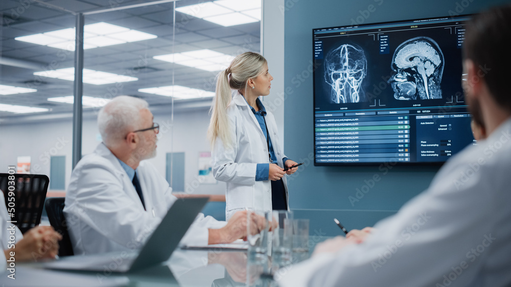 Hospital Conference Meeting Room: Female Neurologist Shows MRI Scan ...