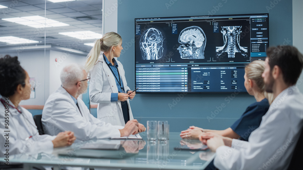 Hospital Conference Meeting Room: Female Neurologist Shows MRI Scan ...