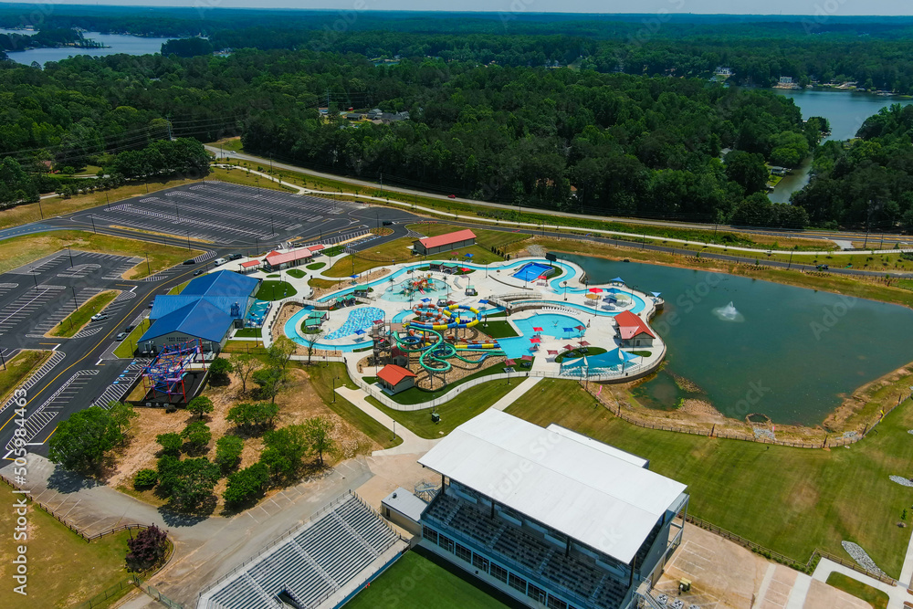 a stunning aerial shot of long winding pools with blue water and ...
