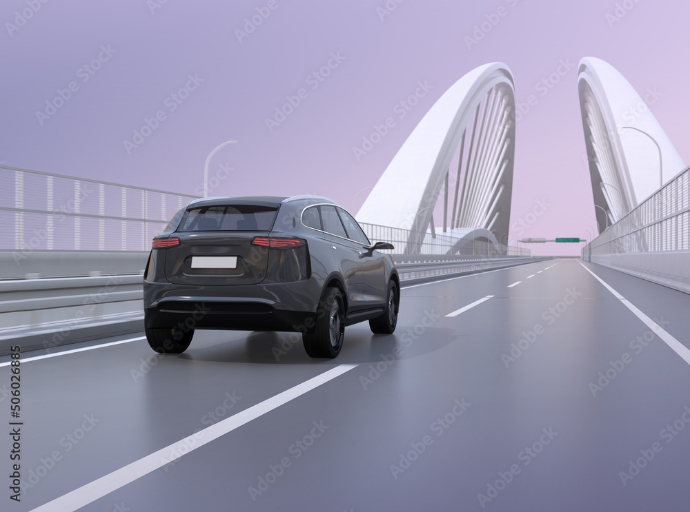 Rear view of black electric SUV driving on the highway bridge. 3D ...