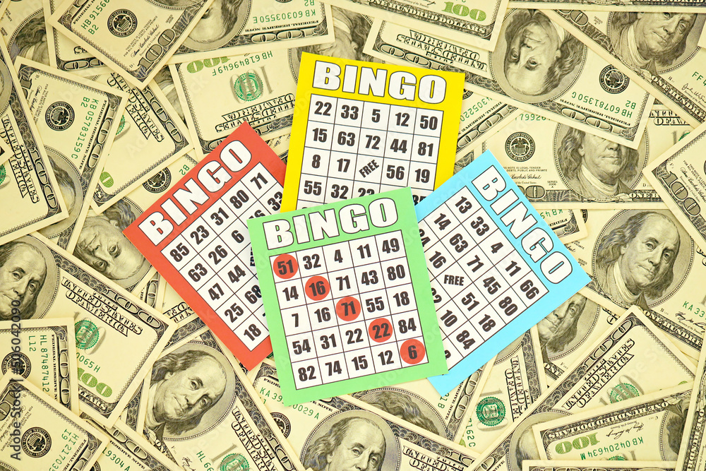 Many bingo boards or playing cards for winning chips and big amount of ...