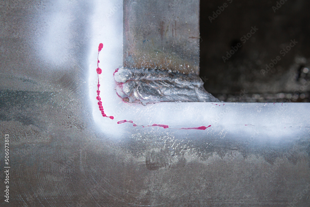 Crack on the surface of steel with Red color defect Penetrant Testing ...