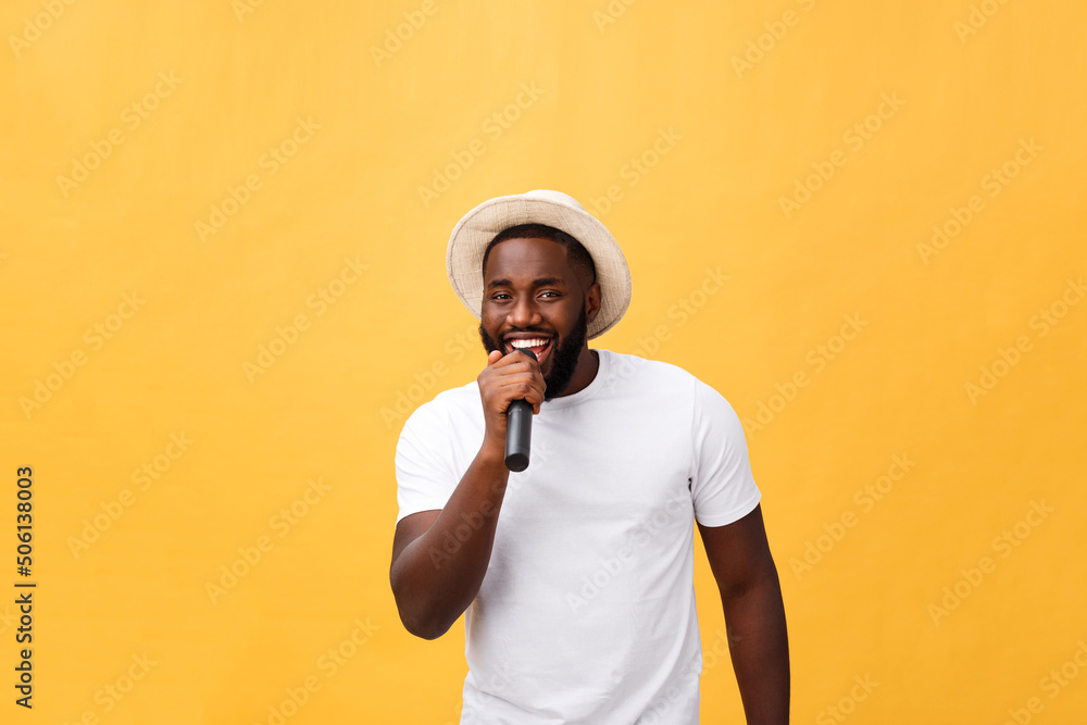 Young teenage black African American boy singer performing at a concert ...