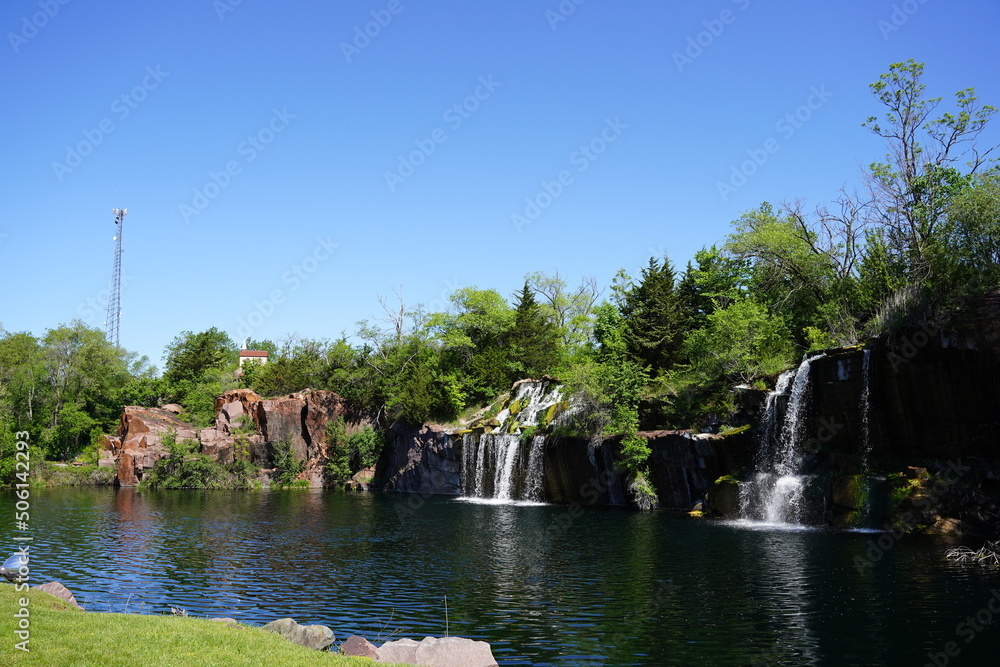 Rock formation, waterfalls, and pond at Daggett Memorial Park in ...